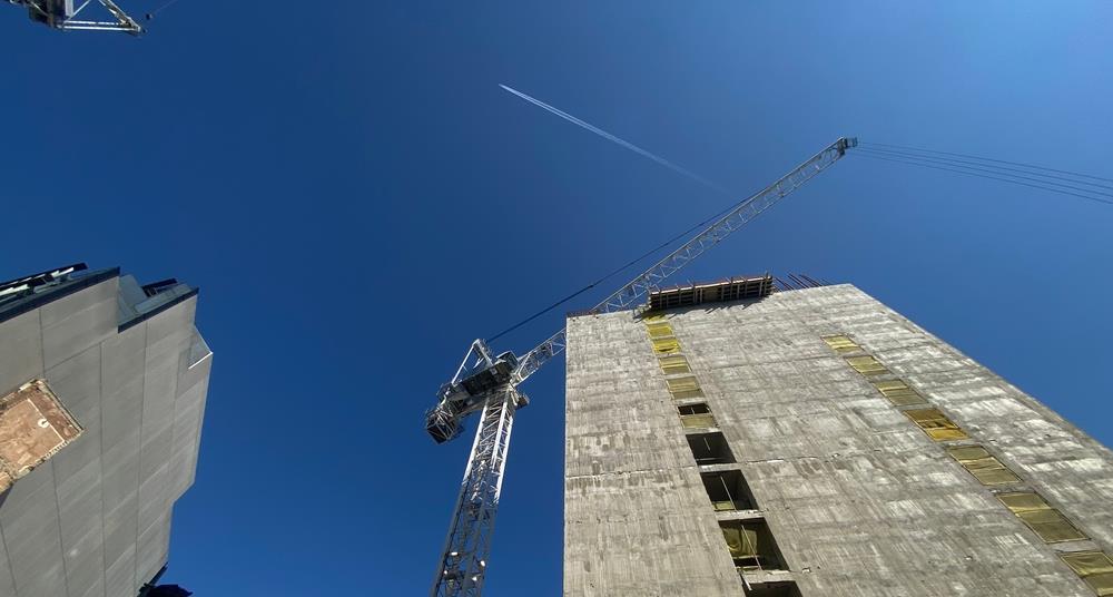 Slide in construction output eases but jobs-cutting hits five-year high ...